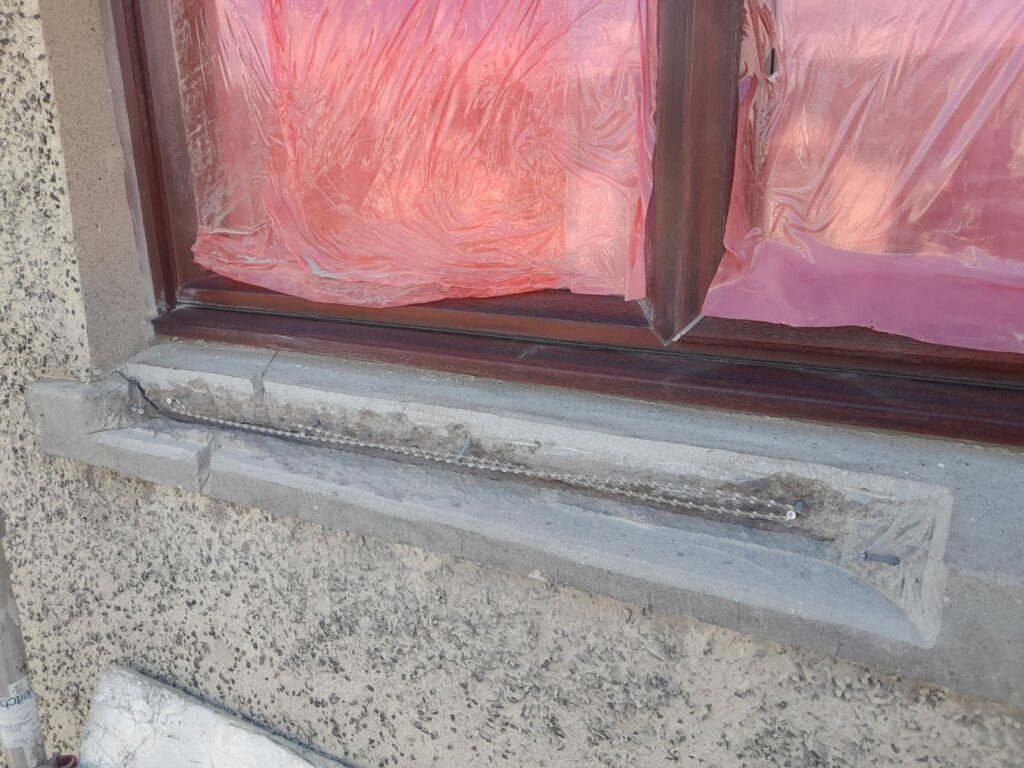 Natural Cement repair to concrete window cills - Richardson & Starling