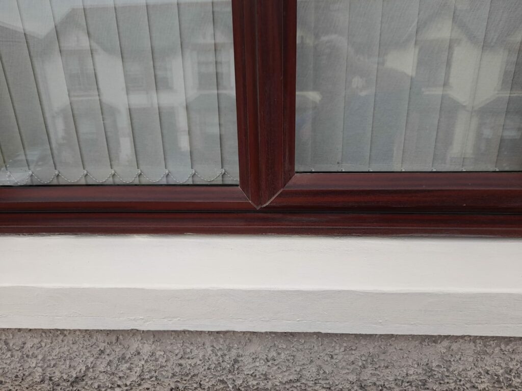 Natural Cement repair to concrete window cills - Richardson & Starling